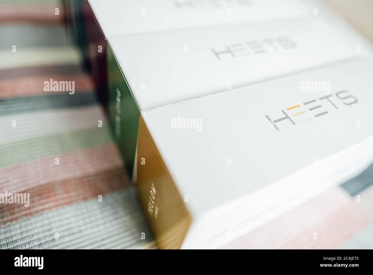 Heating tobacco system IQOS with heets sticks Stock Photo - Alamy