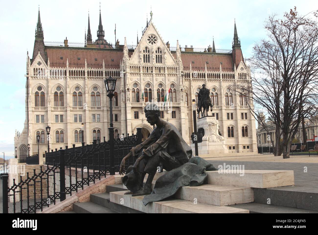 Statue of the Hungarian poet, Attila Jozsef, on the bank of the Danube ...