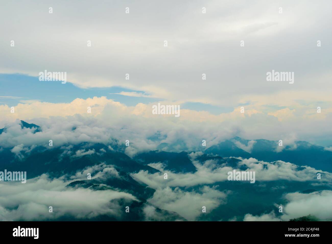 A beautiful view of the low monsoon clouds over the mountain ranges at ...