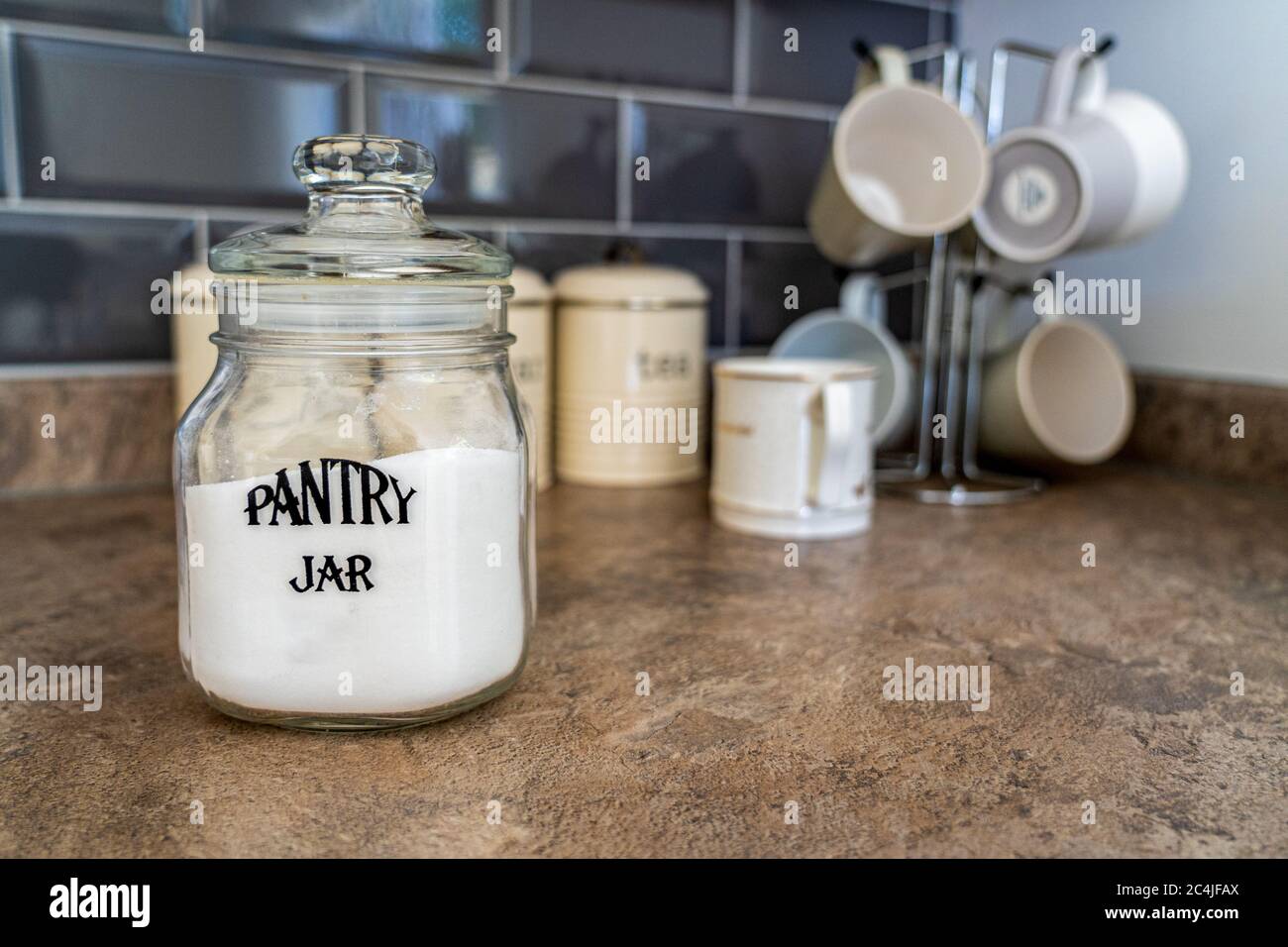 Cooking salt in a glass pantry jar with air tight seal Stock Photo - Alamy