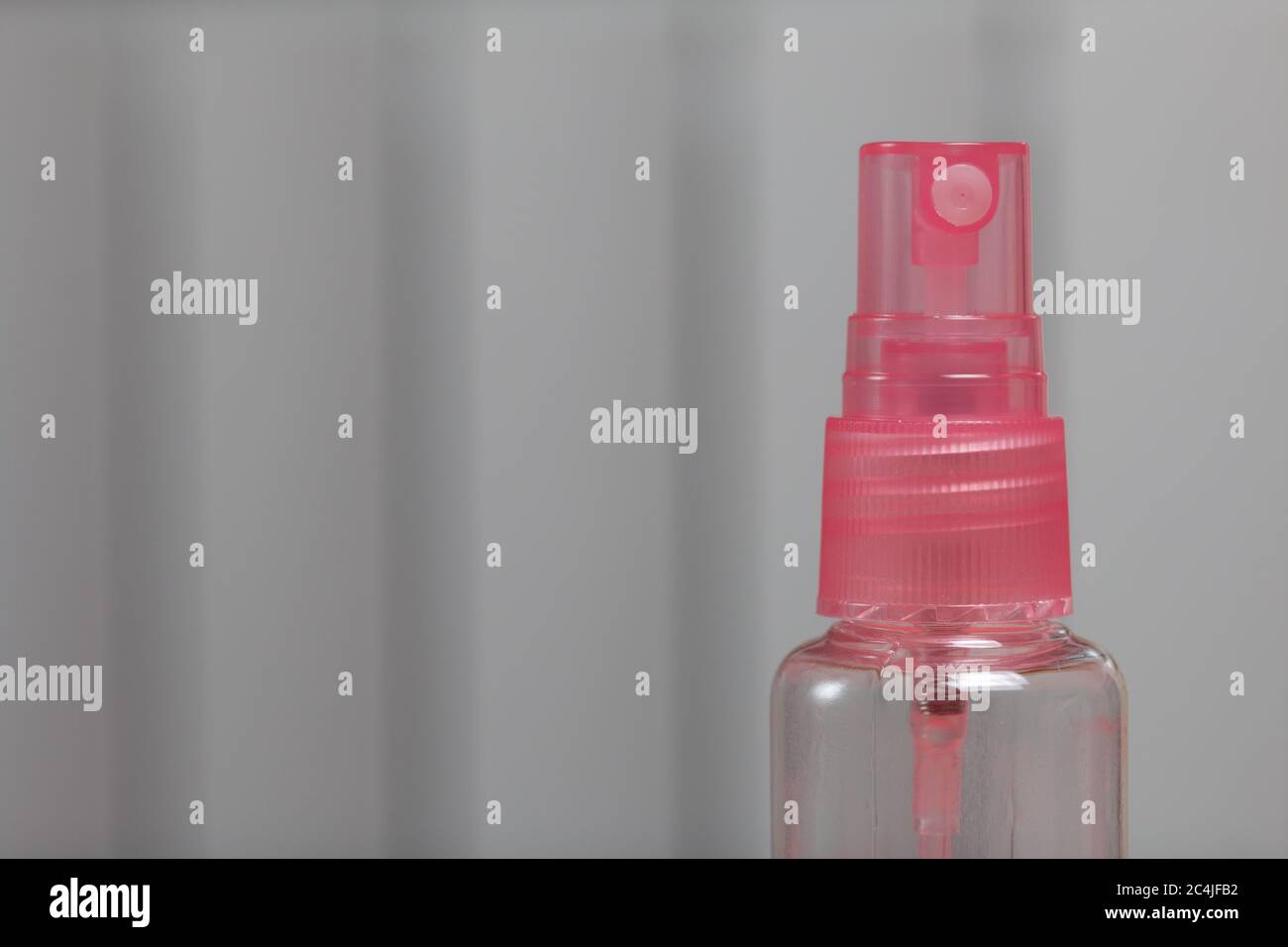 Plastic bottles for cosmetics with a spray. Close-up shot Stock Photo ...