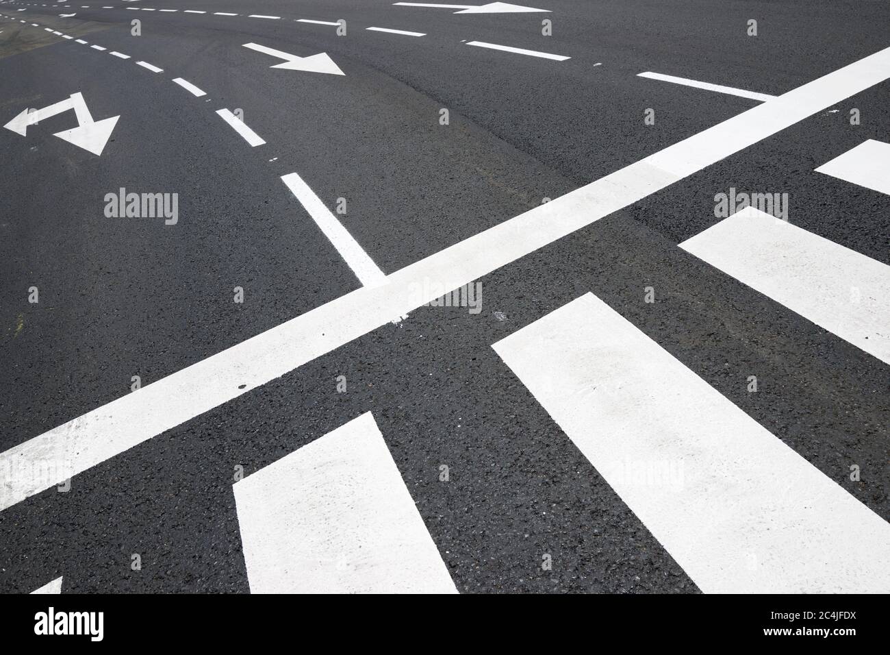 Arrow directional signals and zebra crossing painted on the floor in ...