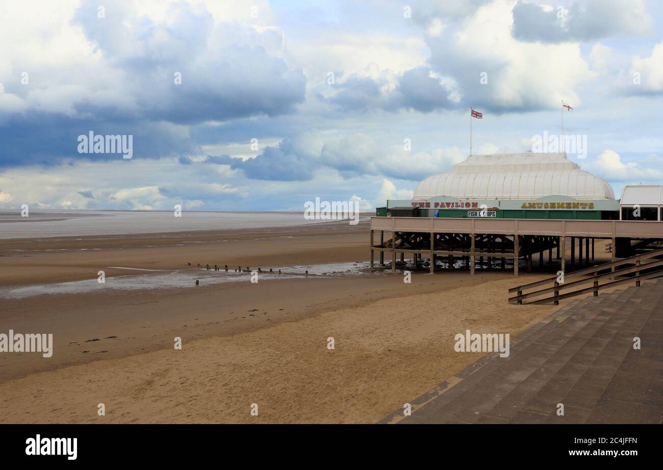 The shortest seaside pier in Britain with small shops selling food and ...