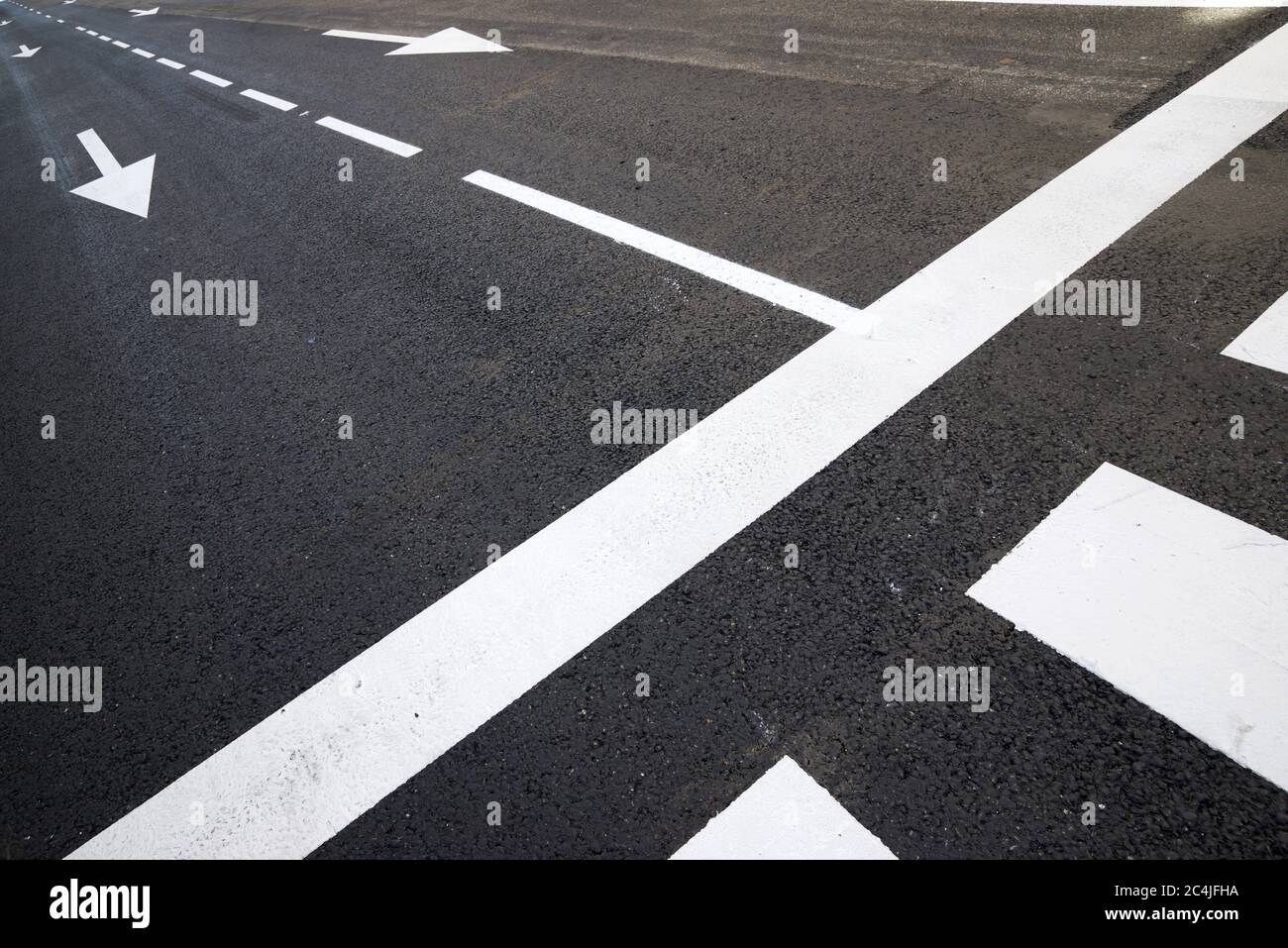 Arrow directional signals and zebra crossing painted on the floor in ...