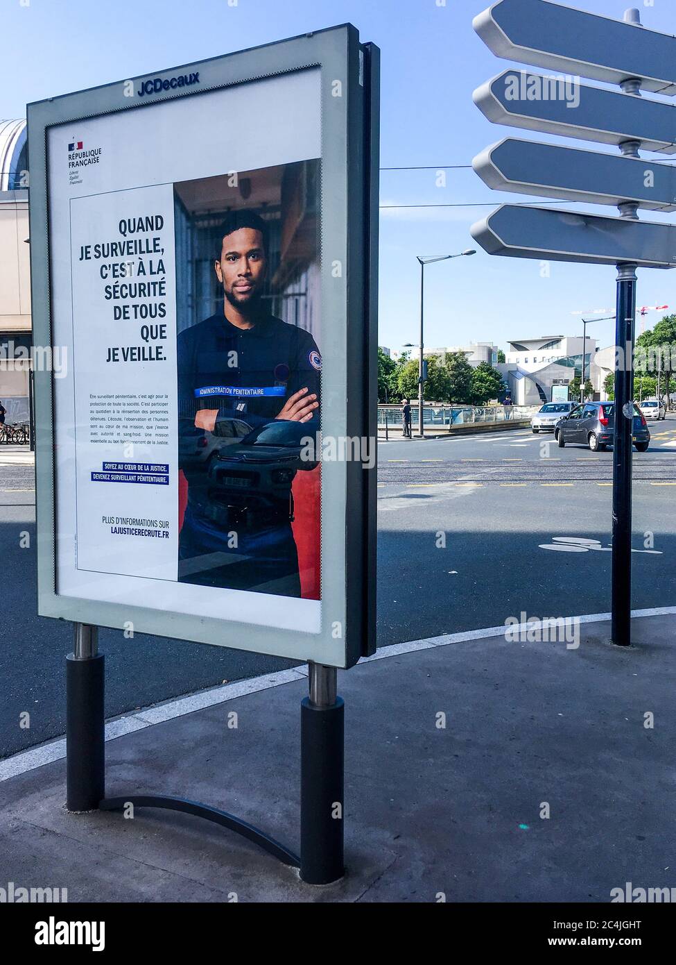 Poster promoting prison guard job, Lyon, France Stock Photo - Alamy