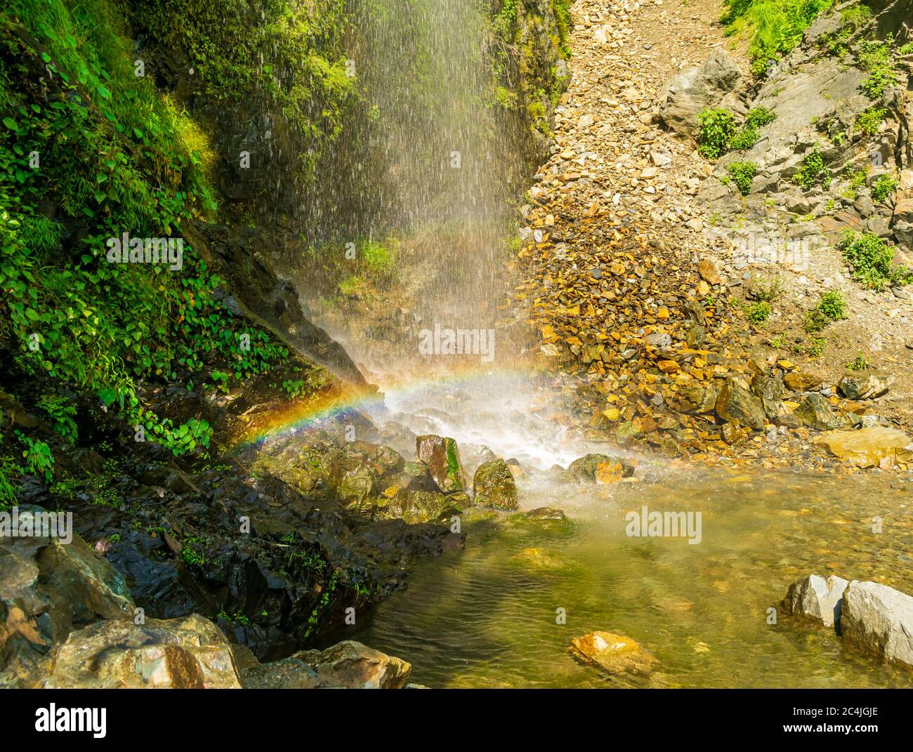 A perennial roadside waterfall and a rainbow, Mussoorie, Uttarakhand ...