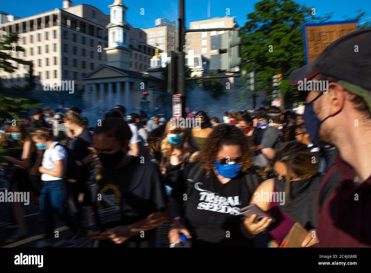 Protestors flee police as tear gas, rubber bullets and flash grenades ...