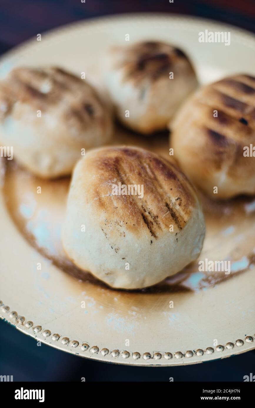Roosterbrood or braai bread—bread fresh-baked on the barbecue or braai ...