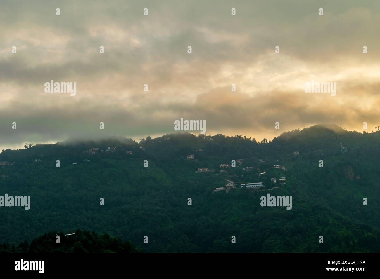 Sunset view of the Mussoorie cityscape from Landour, Uttarakhand, India ...