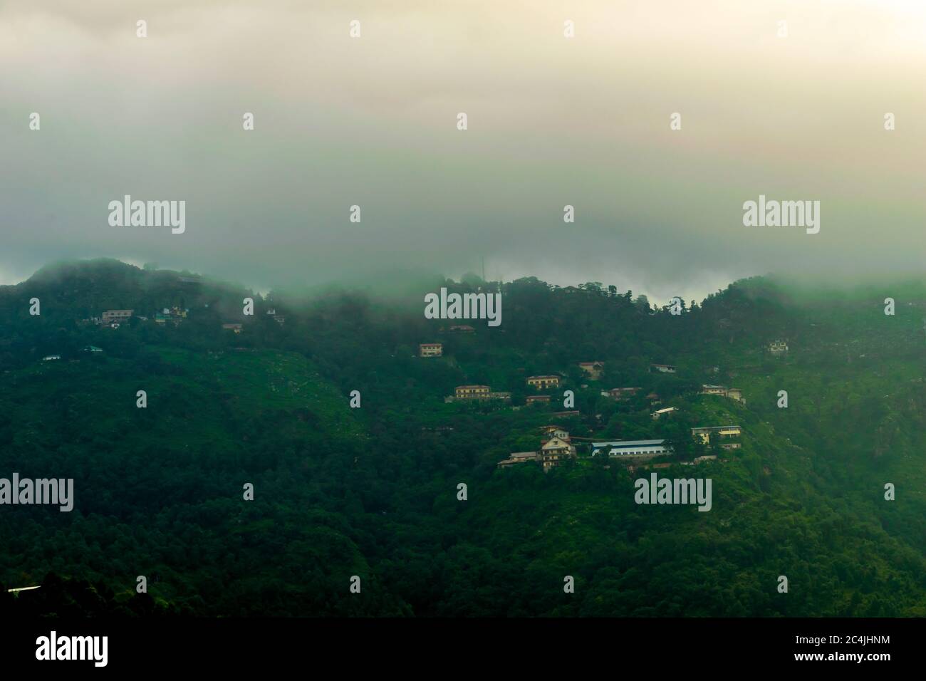 Sunset view of the Mussoorie cityscape from Landour, Uttarakhand, India ...