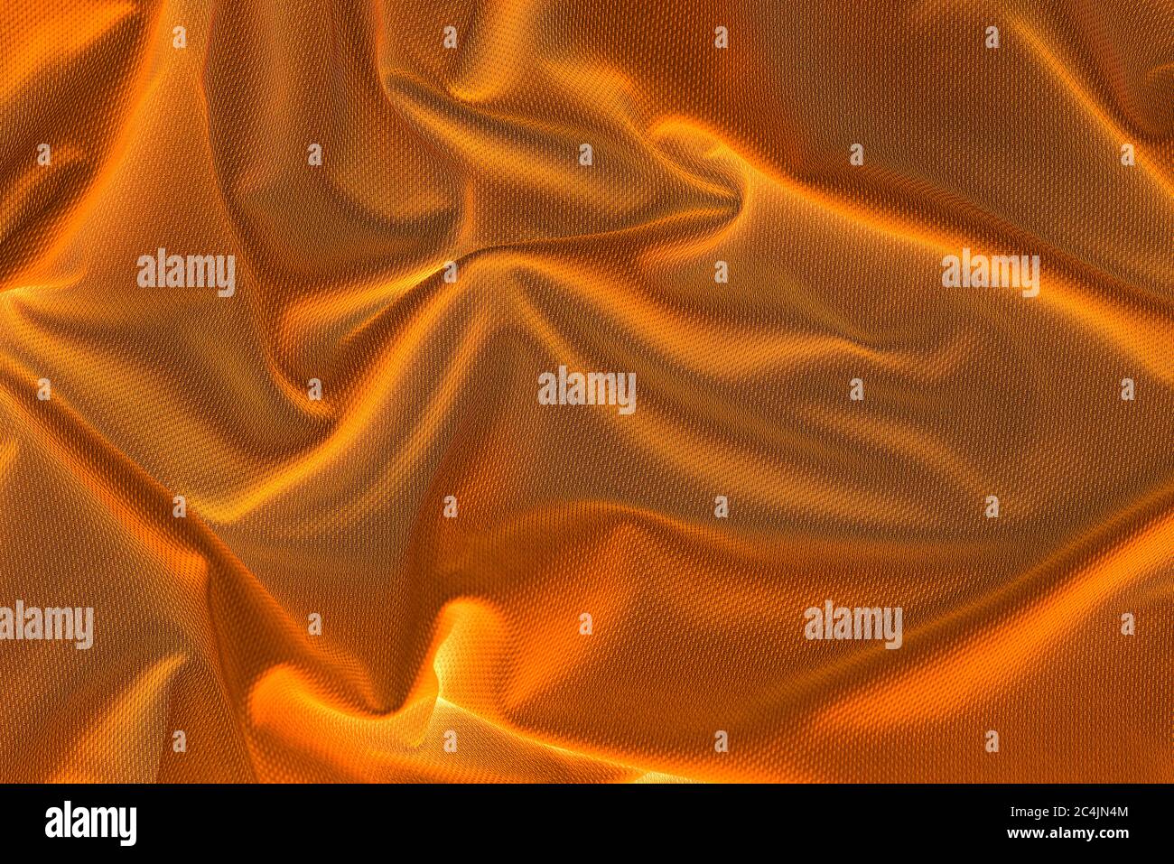 Golden fabric, cloth as wave background Stock Photo - Alamy