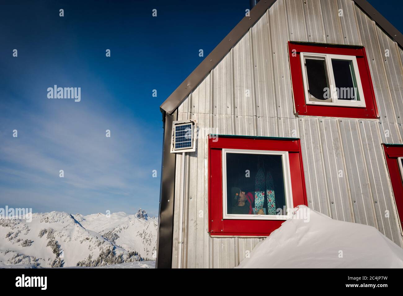 Whistler, BC, Canada: Skier getting his skins inside the Brew Hut ...