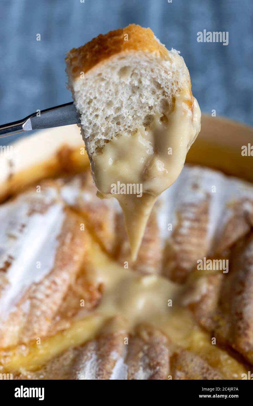 swiss cheese fondue with bread Stock Photo - Alamy