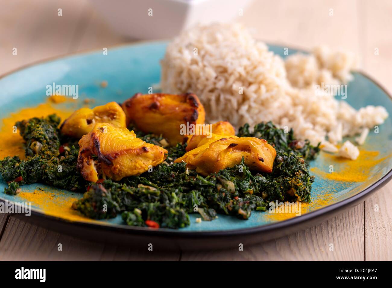 indian murgh palak dish with rice Stock Photo - Alamy