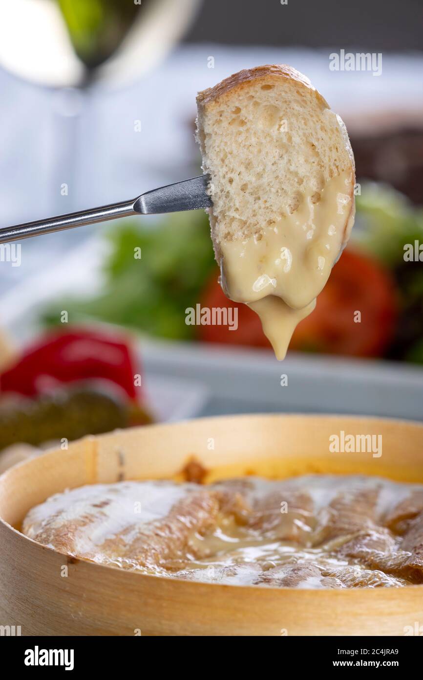 swiss cheese fondue with bread Stock Photo - Alamy