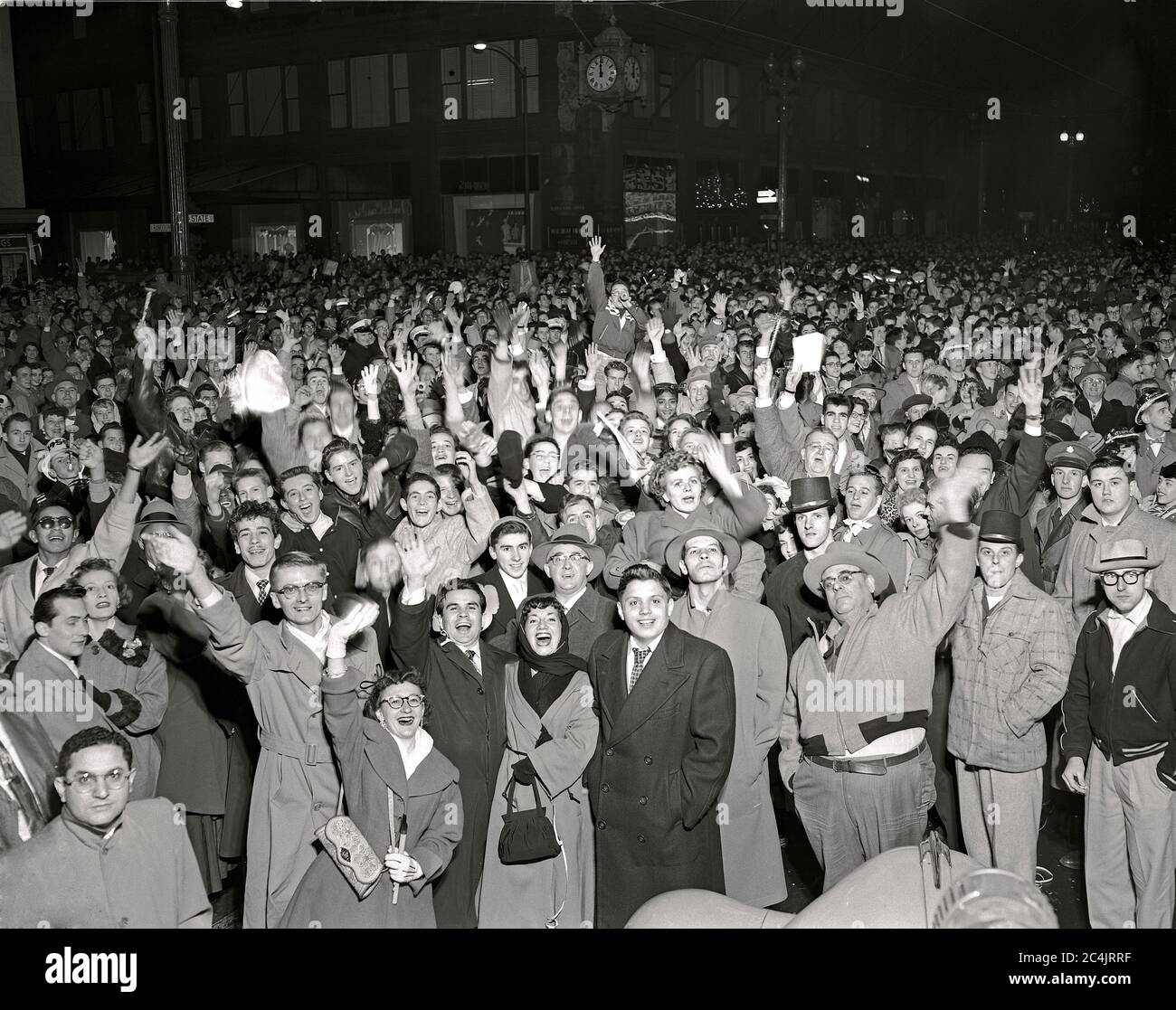 New Year's eve crowd on Chicago's State Street, Janurary 1, 1955. Image ...
