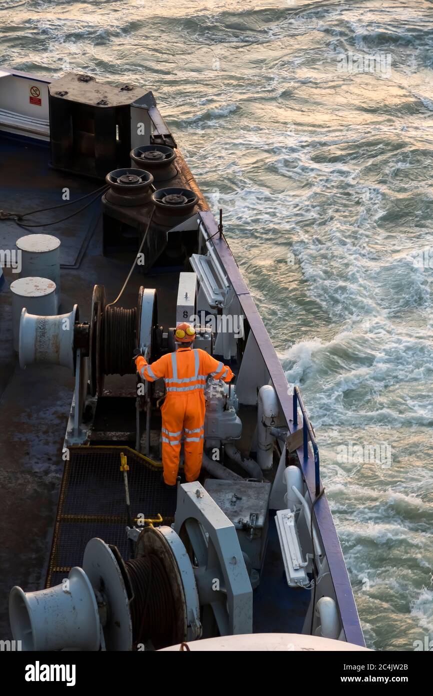 Seaman working on a ship in the sea Stock Photo - Alamy