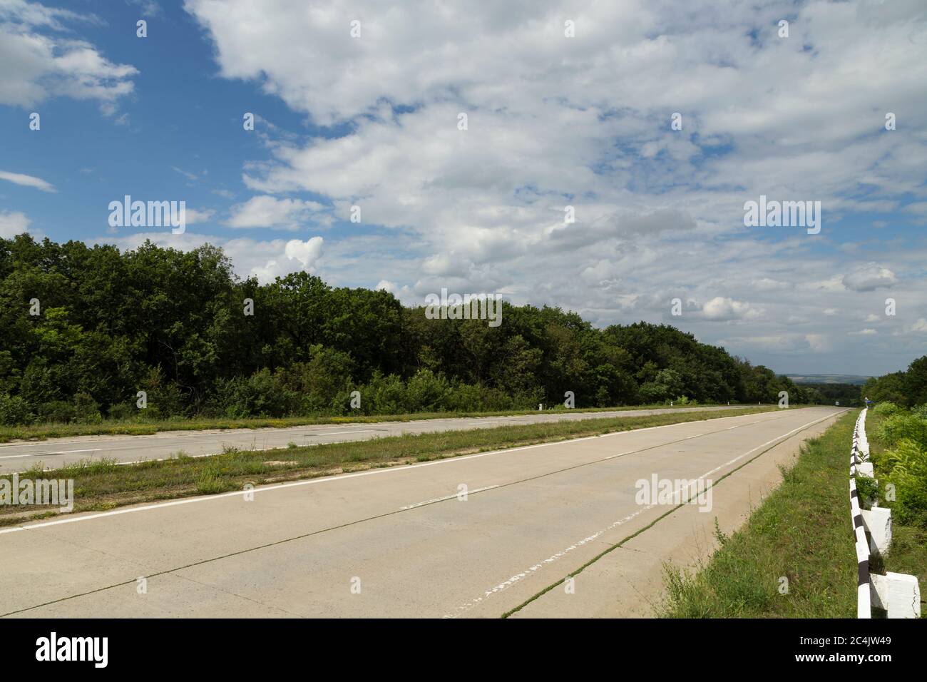 Landscape with a road and clouds. Beautiful views along the highway ...