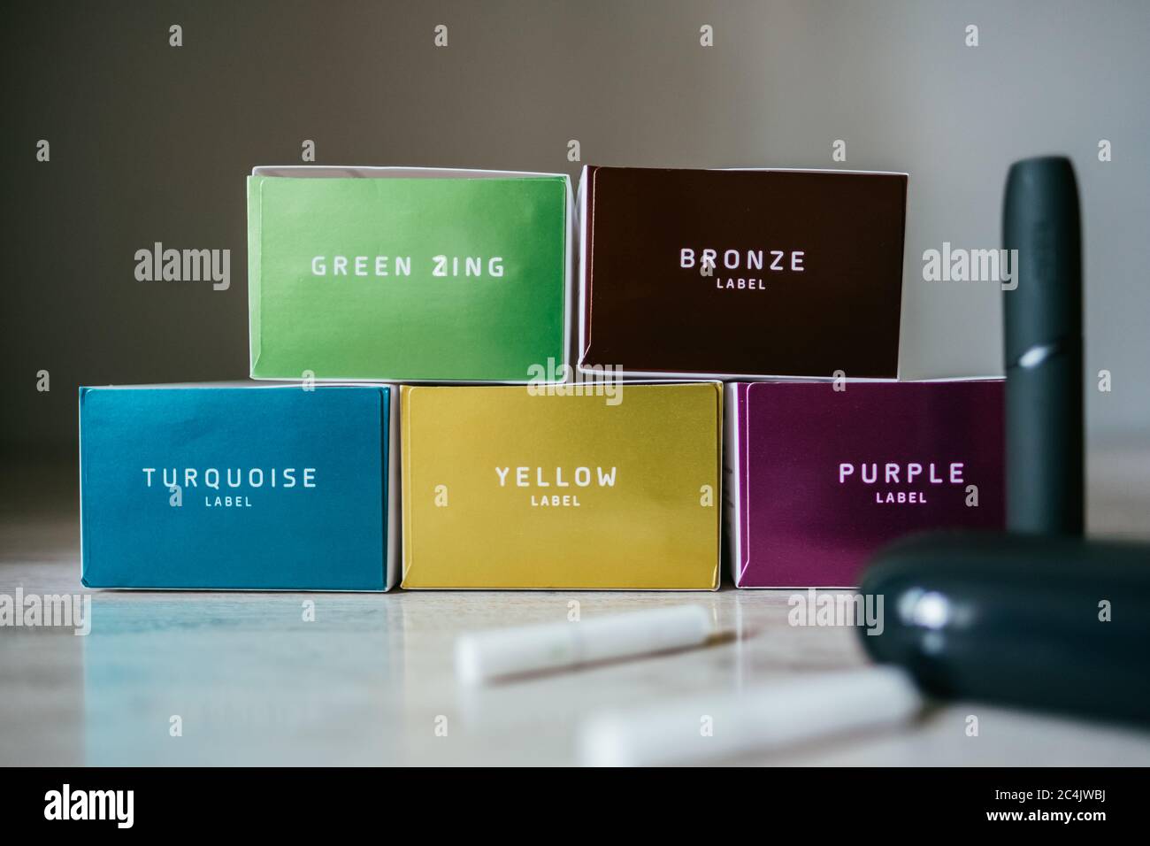 Heating tobacco system IQOS with heets sticks Stock Photo - Alamy