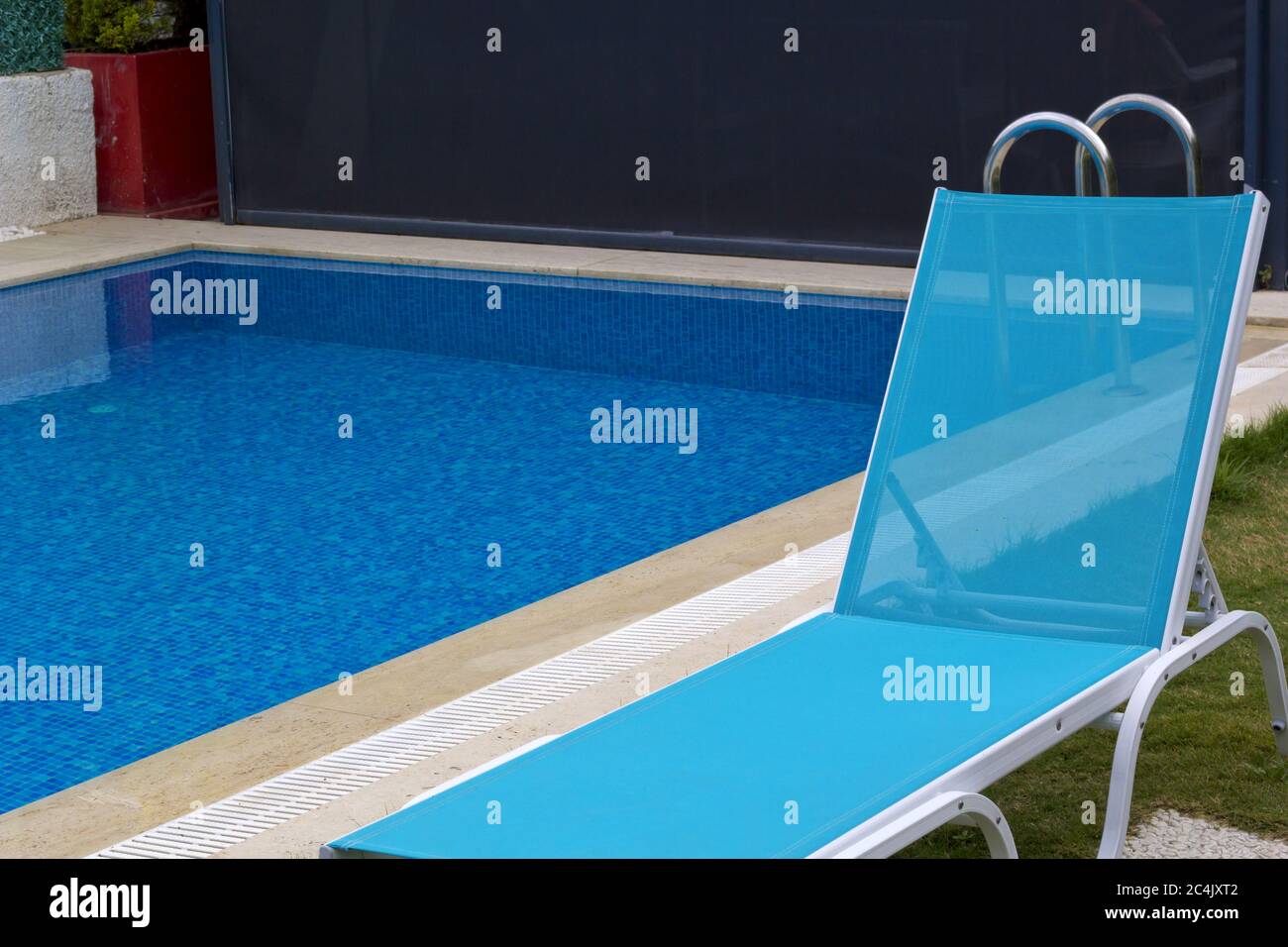 Blue swimming pool in a resort Stock Photo - Alamy