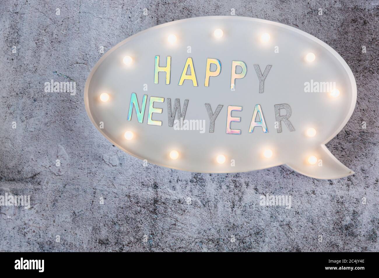 Happy New Year text in lightbox on grey minimalistic background Stock ...