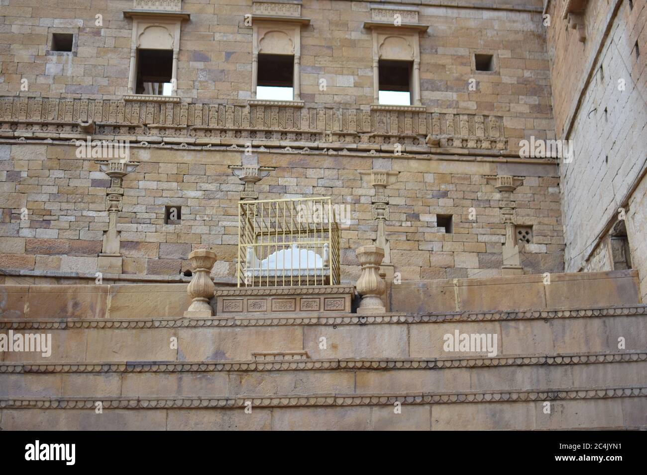 inside the Jaisalmer Fort that emanates the glow of yellow sandstone ...