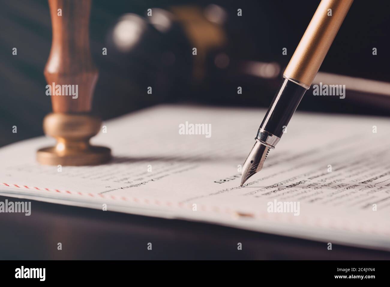 Law, notary background theme. Fountain pen and handmade paper on desk ...