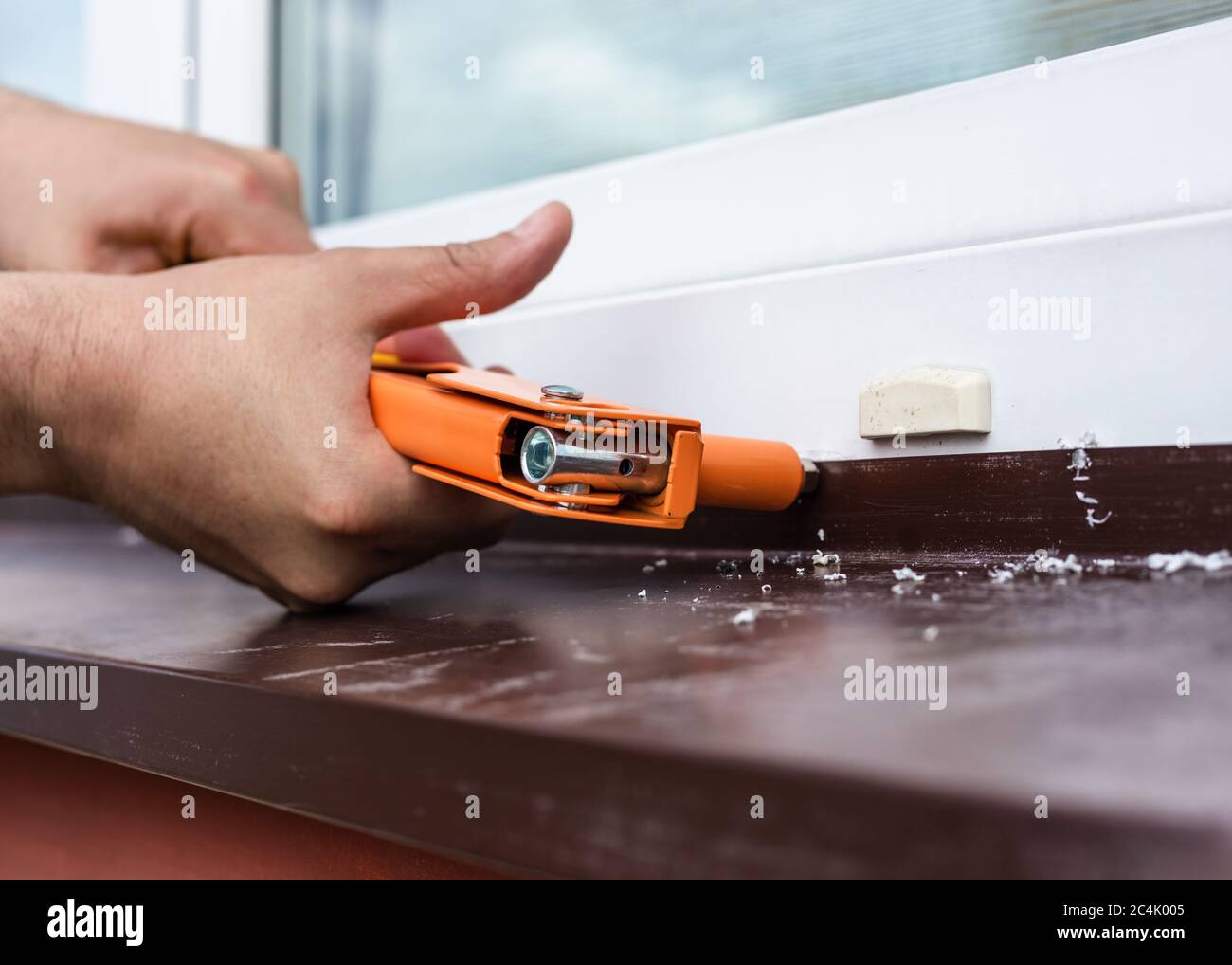 Construction work - installation of rivets. Window tint repair. Plastic ...