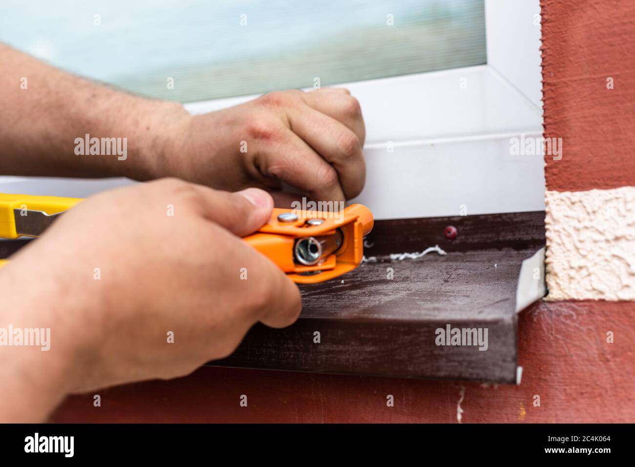 Construction work - installation of rivets. Window tint repair. Plastic ...