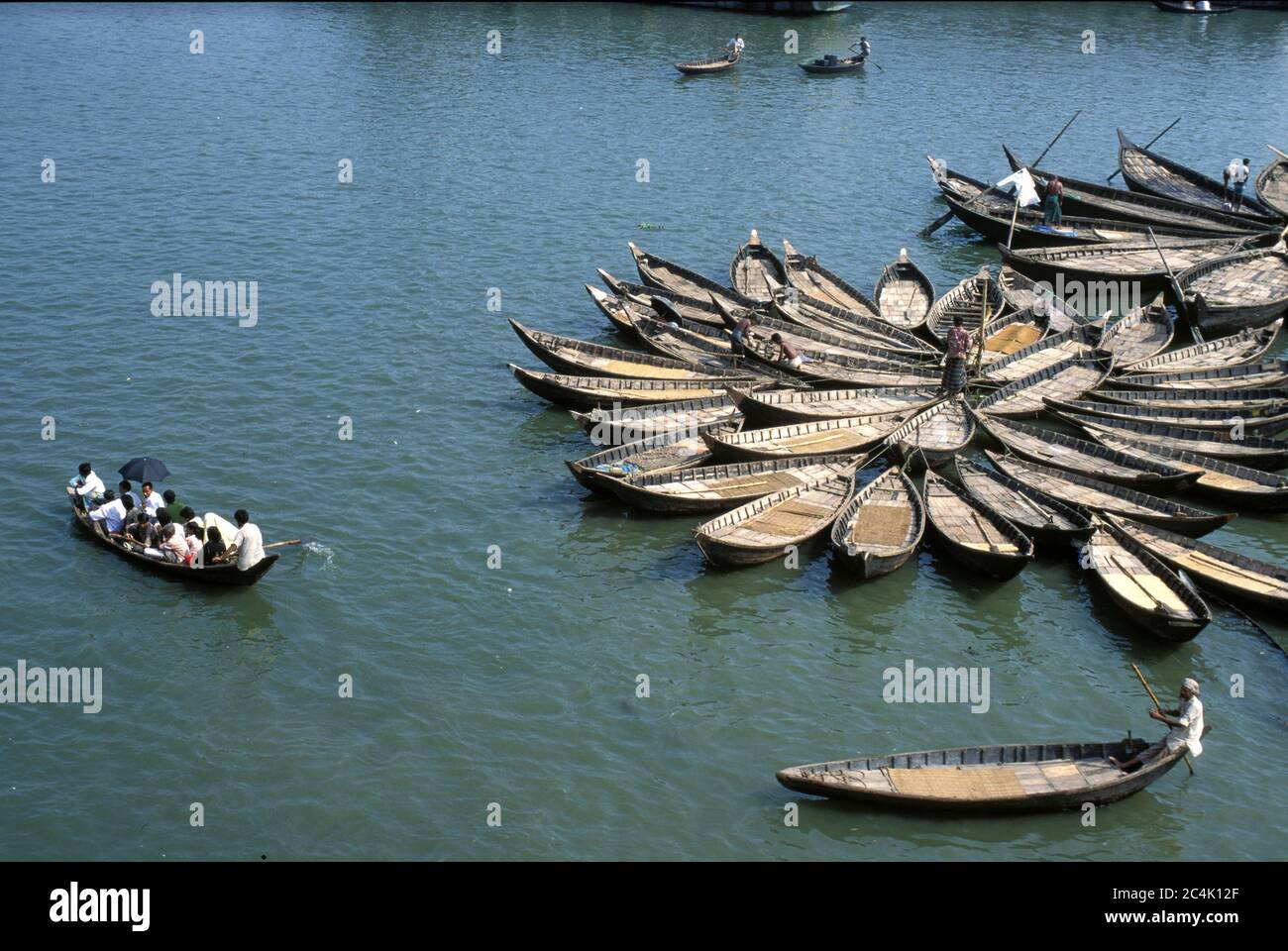 Boats anchored at Sowarighat, Dhaka, Bangladesh. November 1997 Stock ...