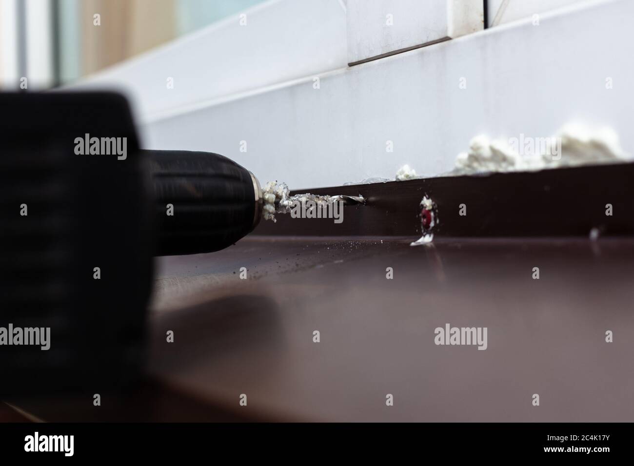 Construction work - drilling holes Stock Photo - Alamy