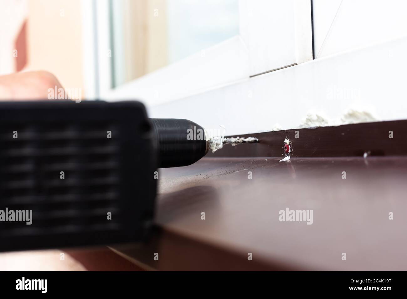 Construction work - drilling holes Stock Photo - Alamy