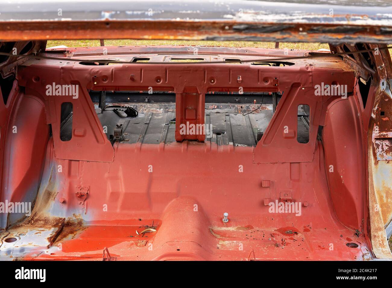 Close up of the rusty frame of a classic car which was undergoing ...