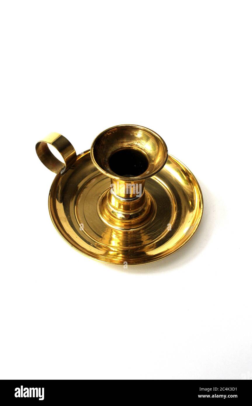 vintage golden candlestick used Stock Photo - Alamy