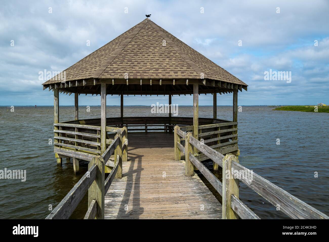 A close-up photo of a Gazebo over water on a boardwalk in Corrola Park ...