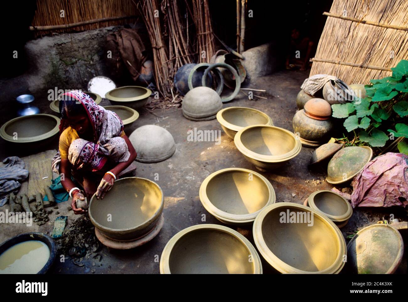 Colourful earthenware like pots, jars and vases enhance the beauty of ...