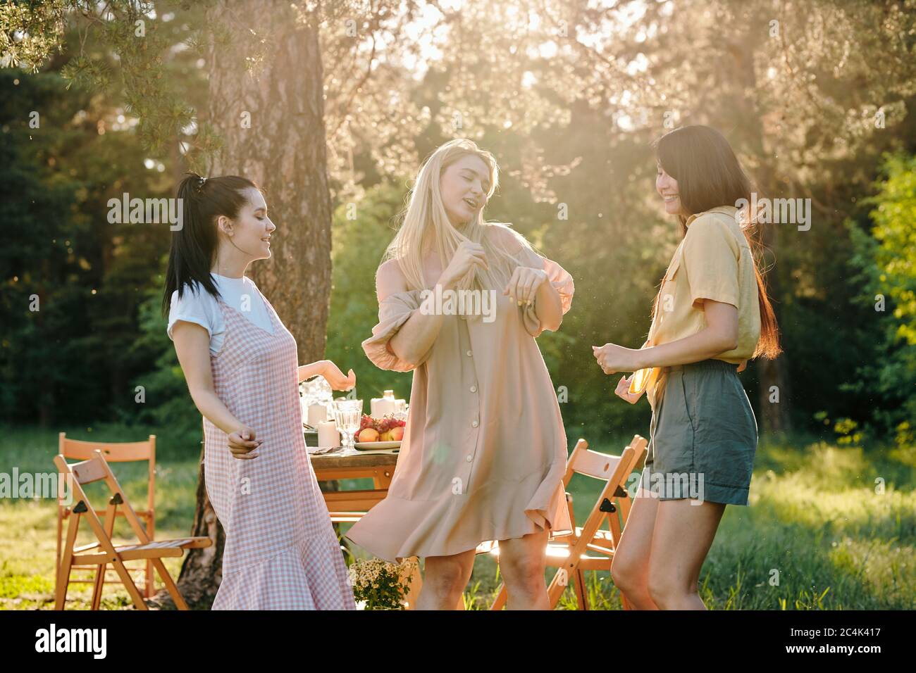 Two girls dancing together hi-res stock photography and images - Alamy