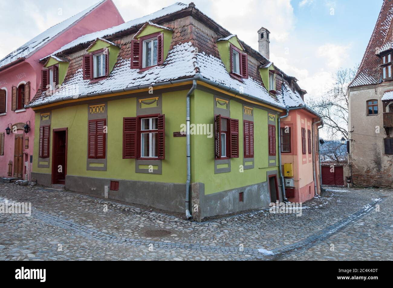Old houses and road made of cubic stone. View of an historic city Stock ...