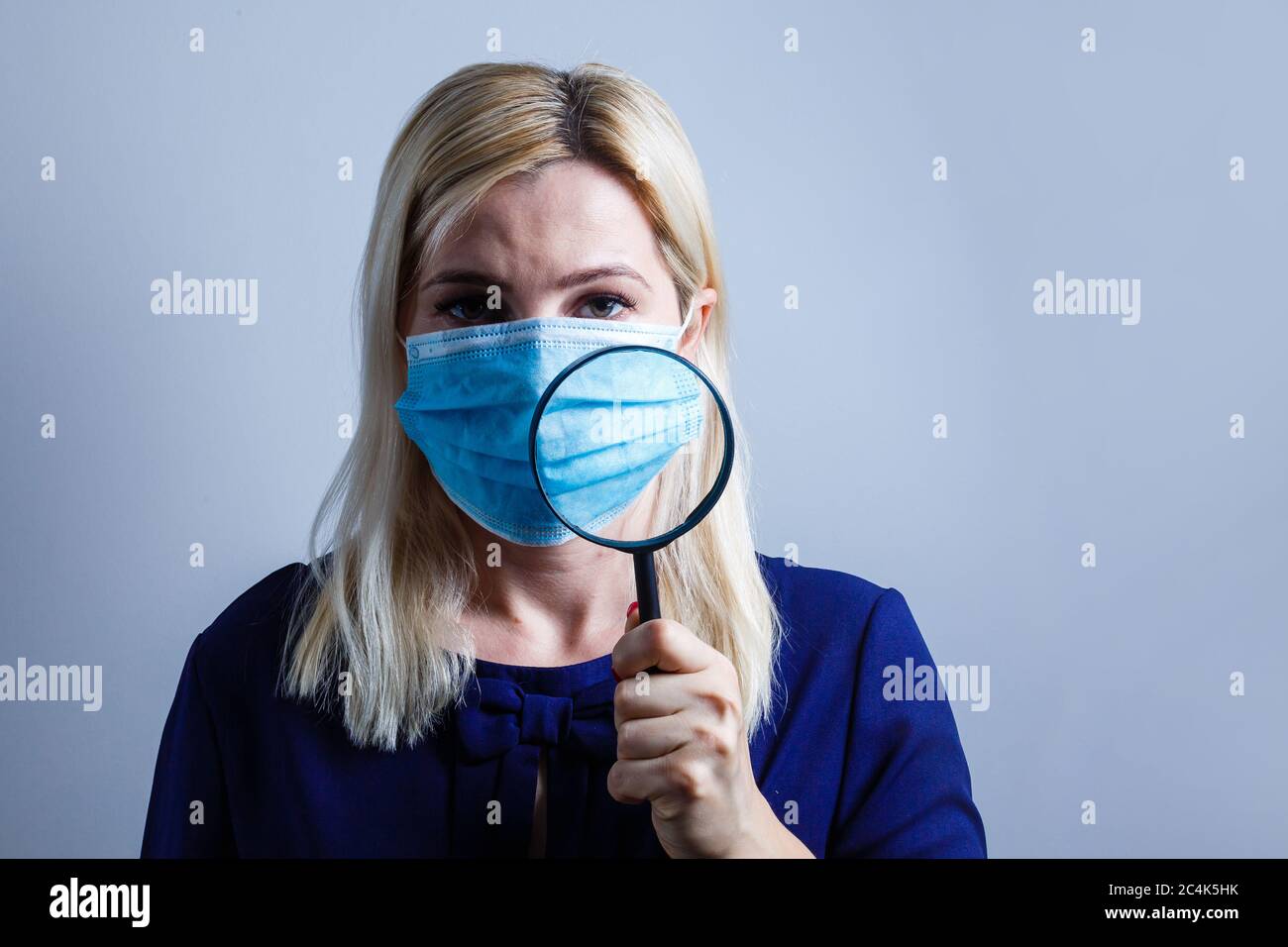 Closeup of a female healthcare professional nurse wearing a protection ...