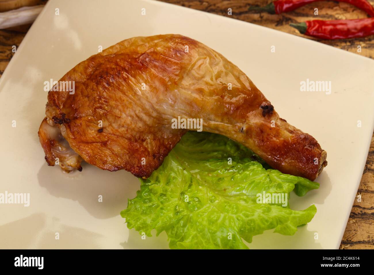 Crispy tasty Roasted chicken leg Stock Photo - Alamy