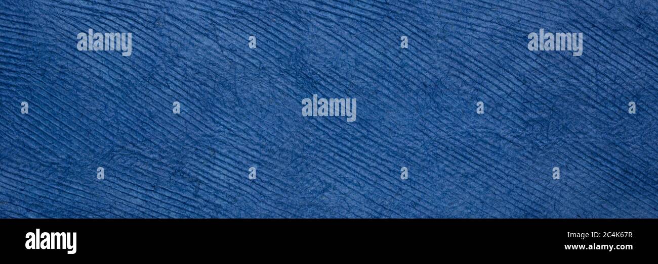 background and texture of blue handmade Huun paper created by artisans ...