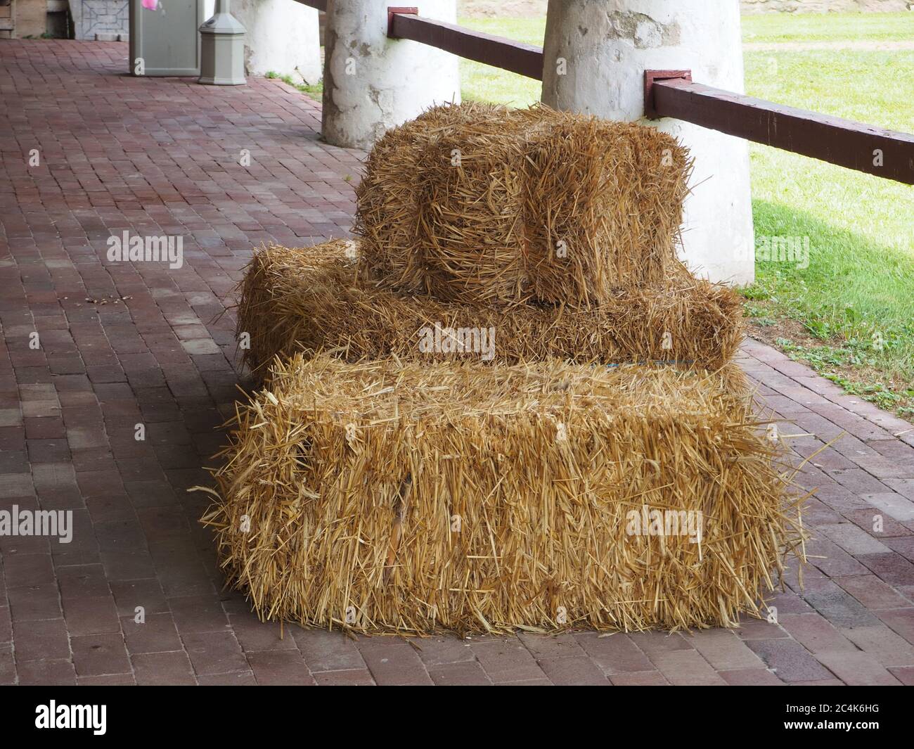The hay is stacked outside the barn Stock Photo - Alamy