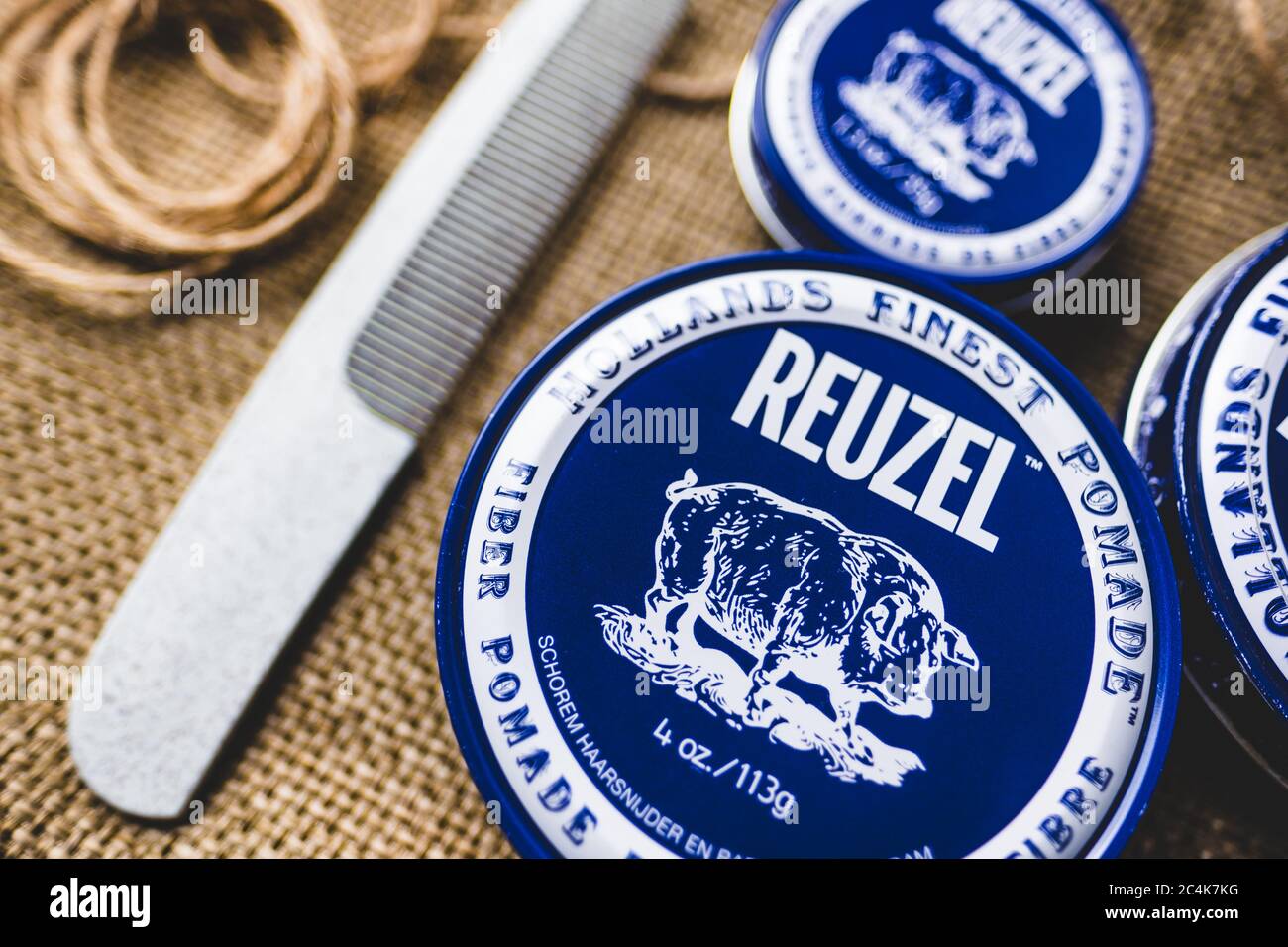 REUZEL hair styling man, fiber pomade Stock Photo - Alamy