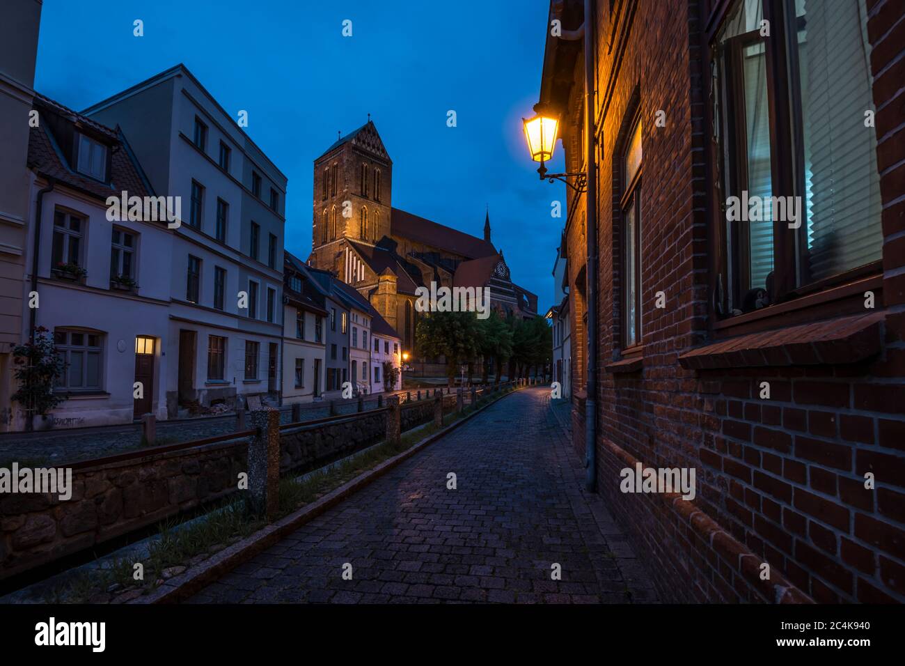 Litte street in Wismar at night Stock Photo - Alamy