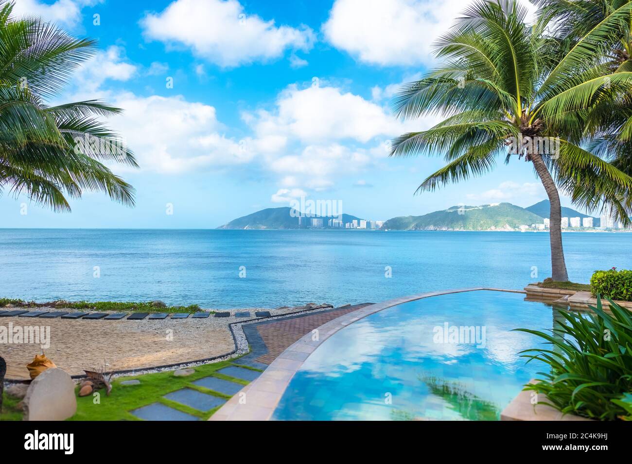 The turquoise swimming pool by the sea Stock Photo - Alamy