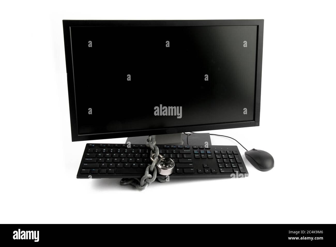 a desktop computer monitor with a chain and lock wrapped around the ...