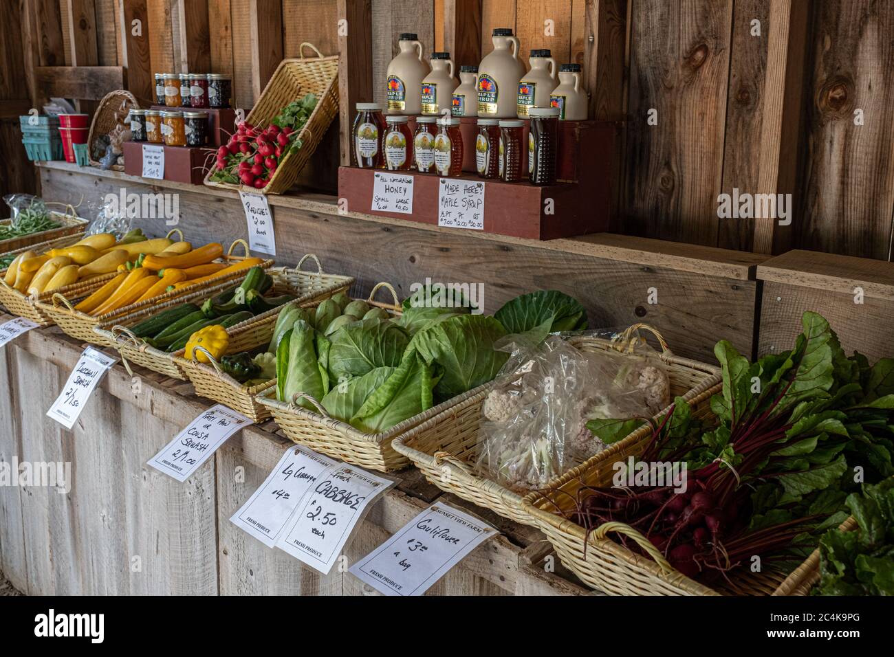 A local fruit and vegetable stand in a rural town in Massachusetts ...