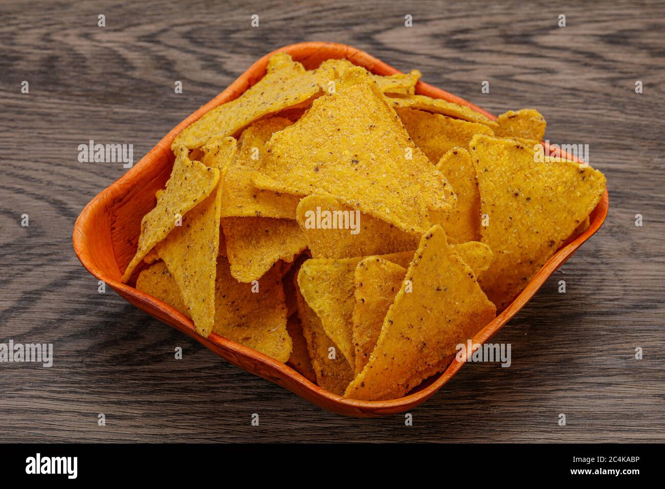 Mexican crunchy corn nachos triangle heap Stock Photo - Alamy