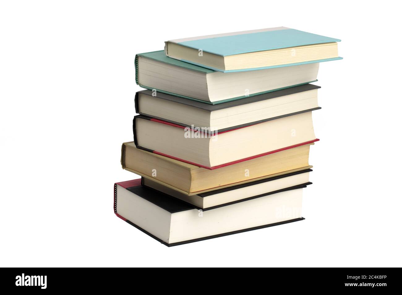 an uneven stack of old hard cover bound books isolated on white Stock ... an uneven stack of old hard cover bound books isolated on white Stock ...