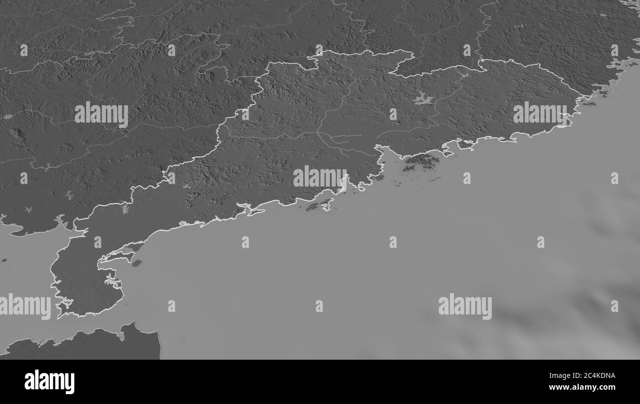 Zoom in on Guangdong (province of China) outlined. Oblique perspective ...